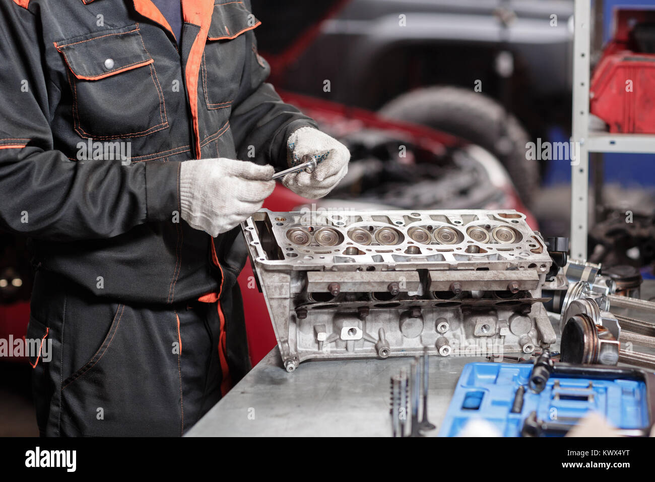 Selective focus. Engine Block on a repair stand with Piston and ...