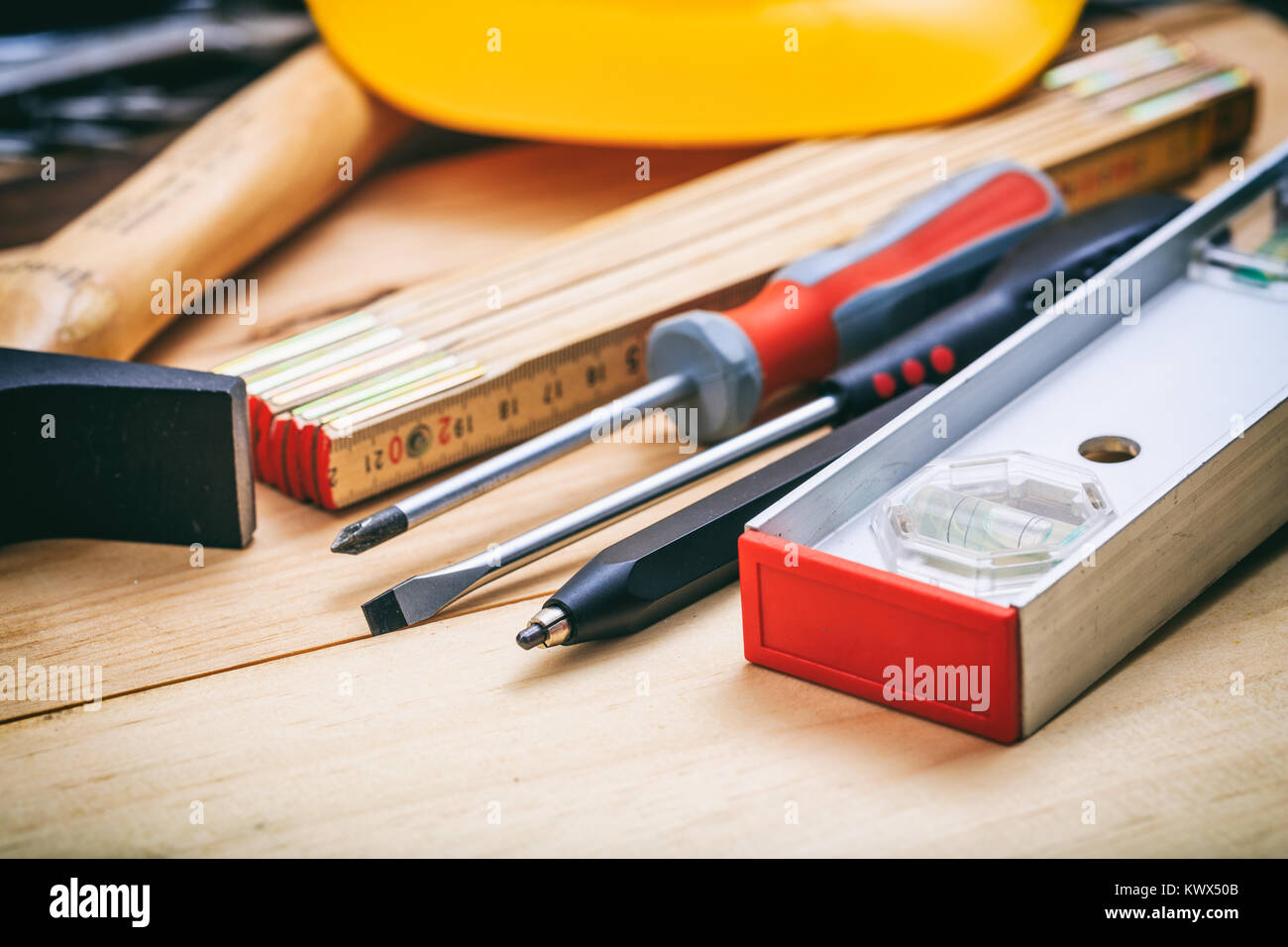 Various hand tools on a wooden bench Stock Photo - Alamy