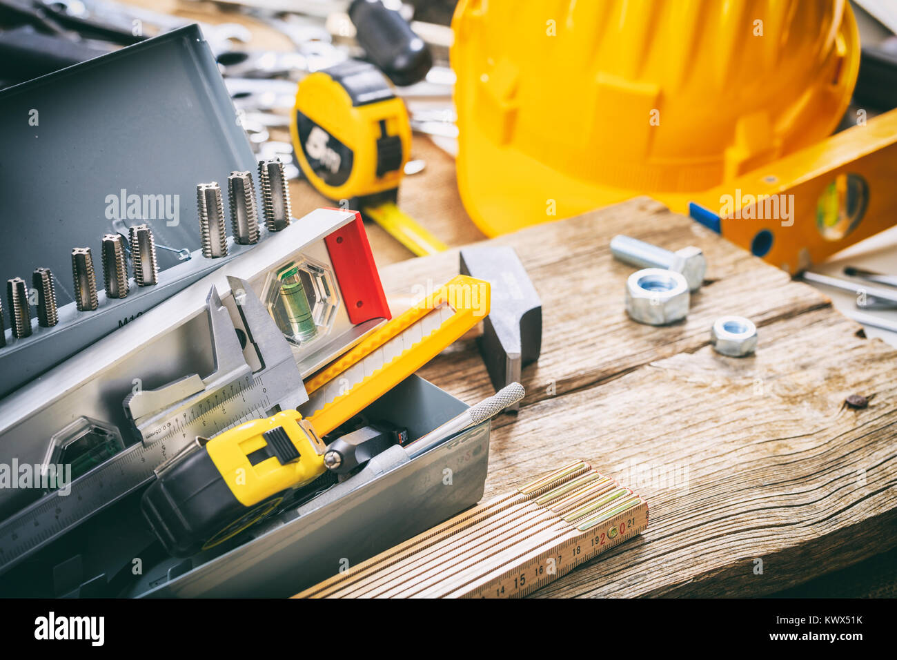 Carpenter tools helmet hi-res stock photography and images - Alamy