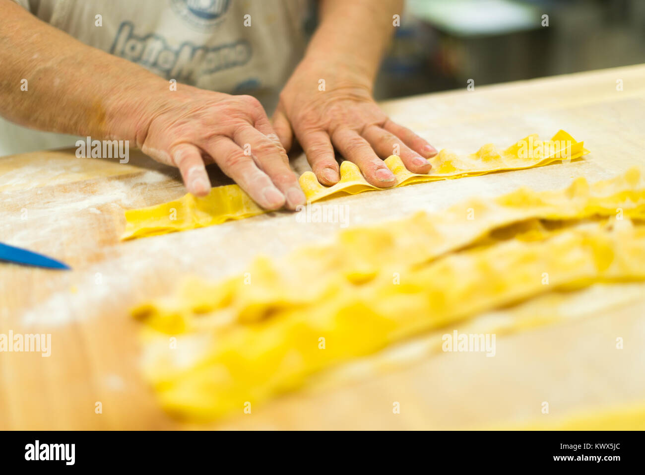 Wrinkled hands making pasta hi-res stock photography and images - Alamy