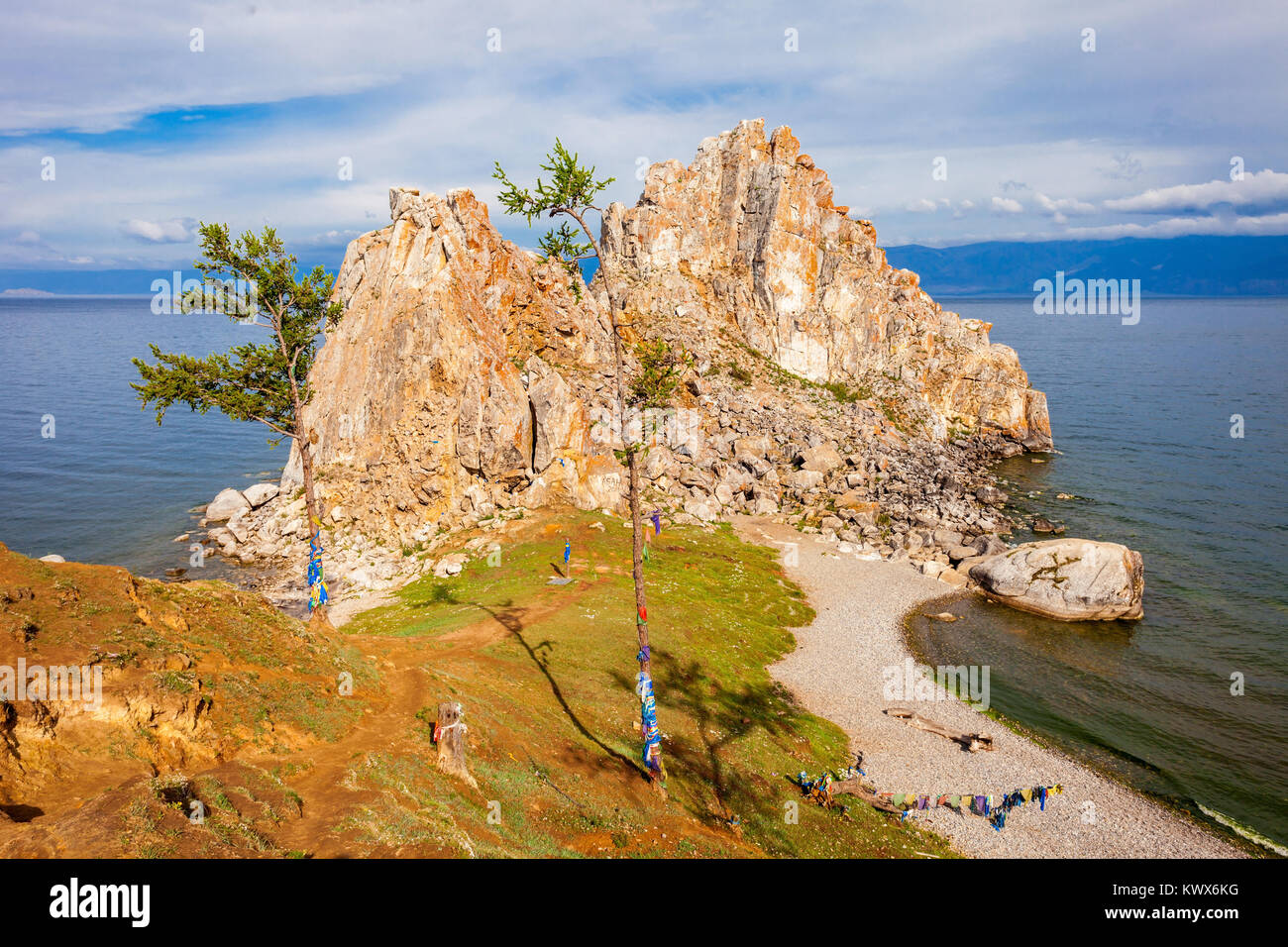 Shamanka (Shamans Rock) on Baikal lake near Khuzhir at Olkhon island in ...