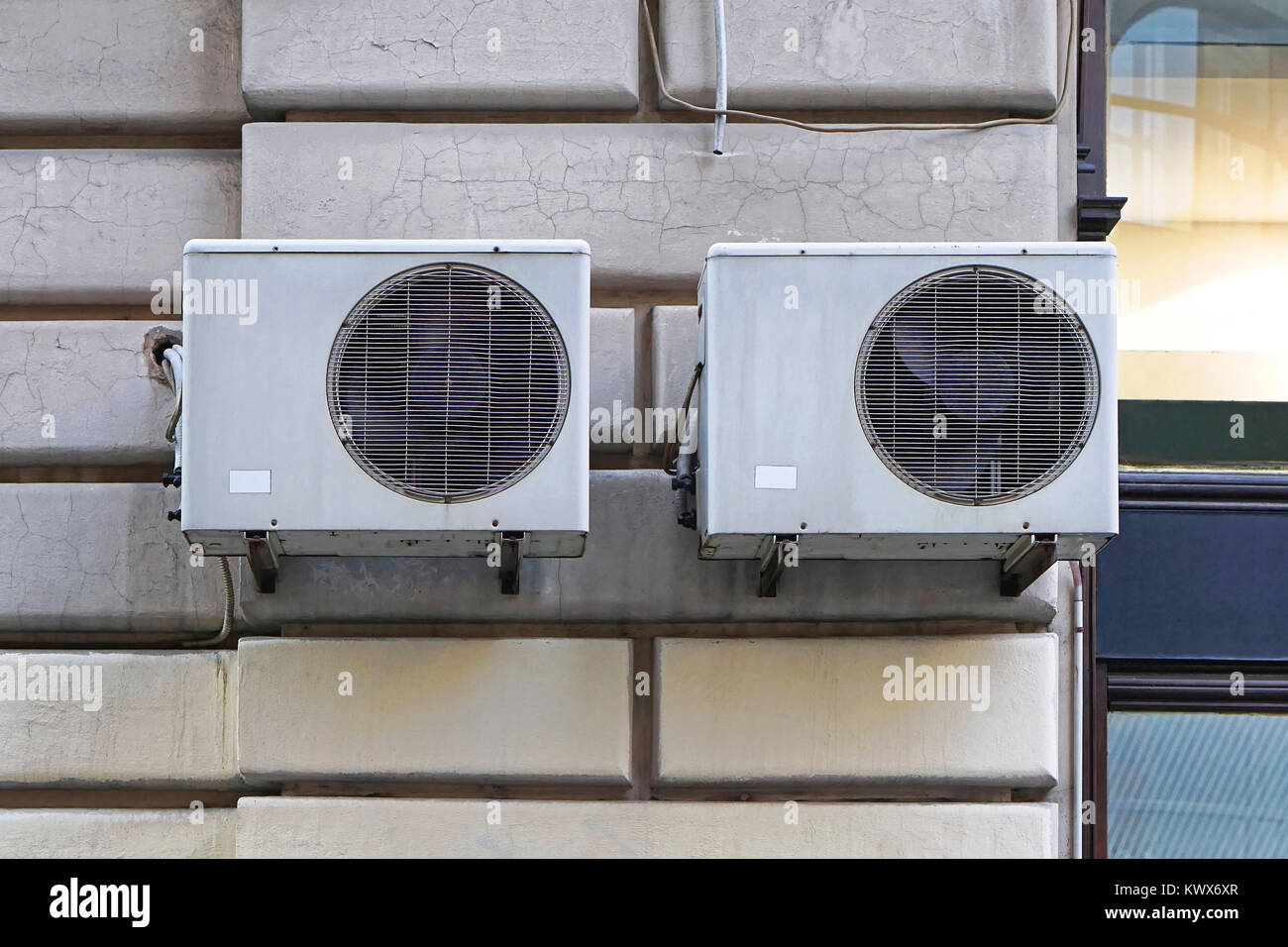 Two external air conditioner device units Stock Photo - Alamy
