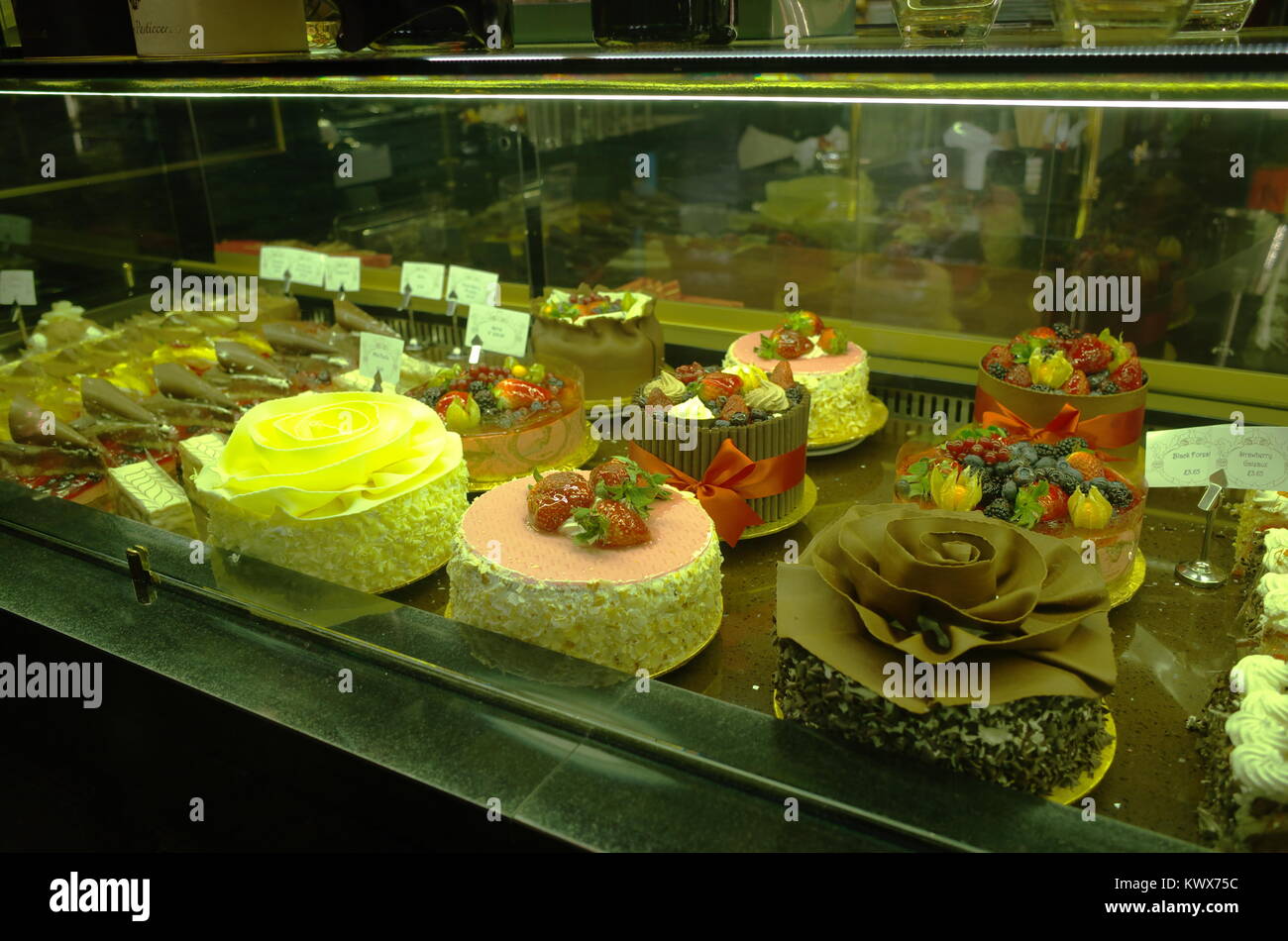 Cake shop window display Stock Photo - Alamy