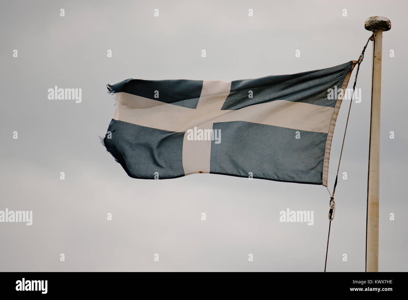 The Cornish (Cornwall, UK) flag flying in the wind Stock Photo - Alamy