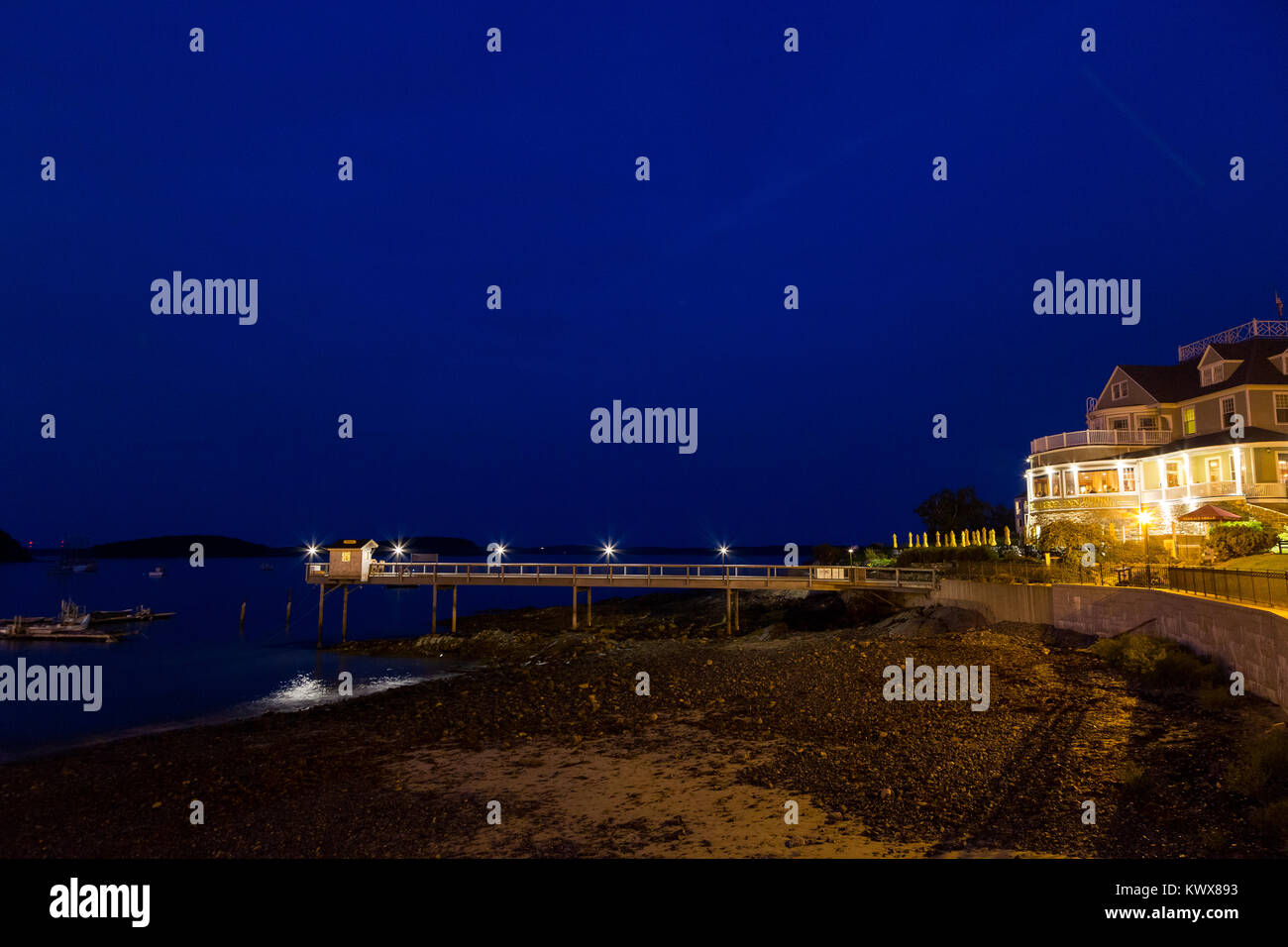 A pier extending into the Atlantic Ocean from the Shore Path. Bar ...