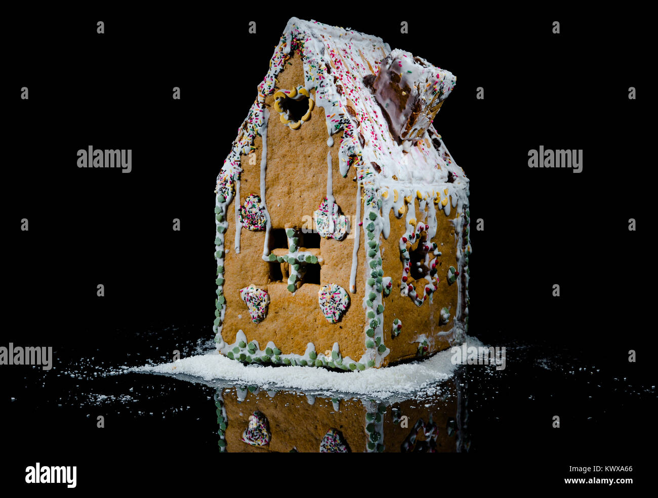 Handmade gingerbread sweet house on black background, Christmas time ...