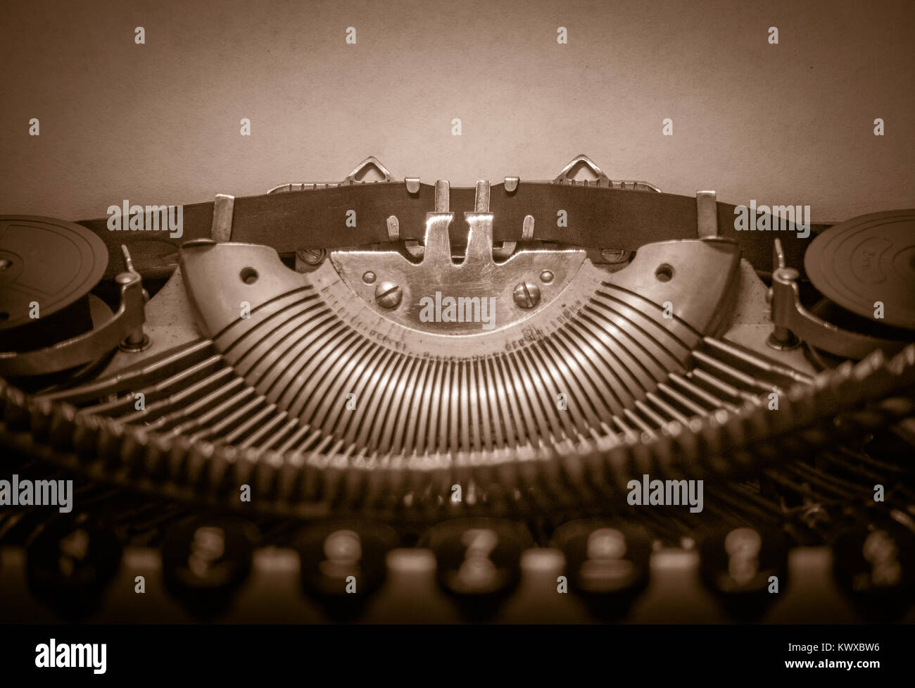 Typewriter ready for use with blank paper installed Stock Photo - Alamy