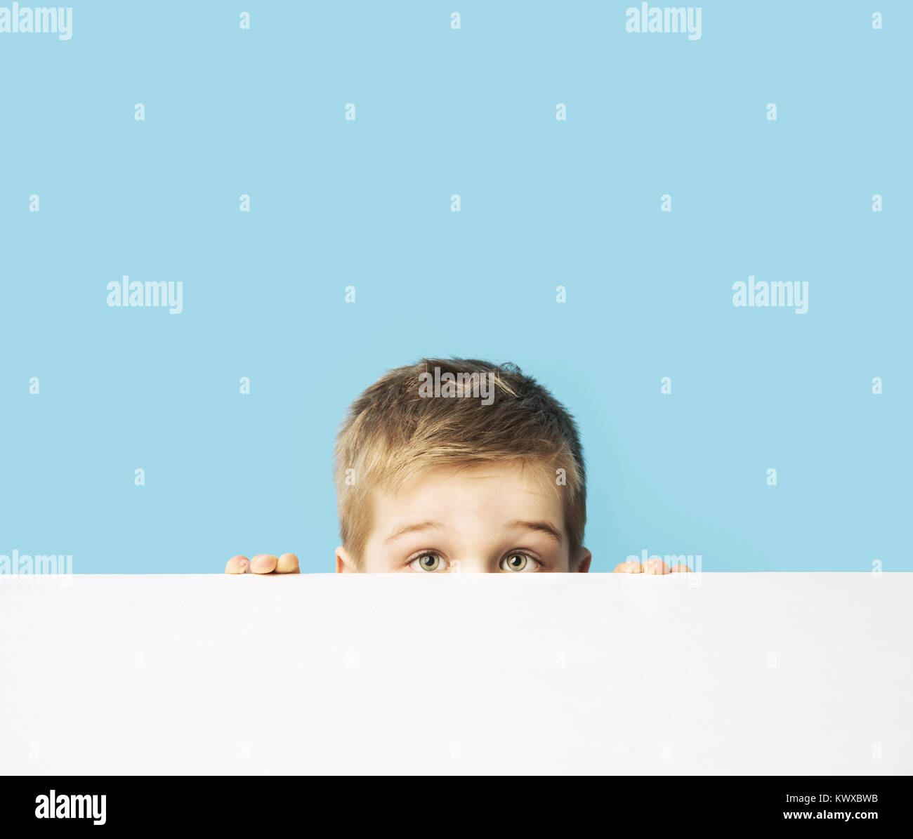 Portrait of the small shy kid Stock Photo - Alamy