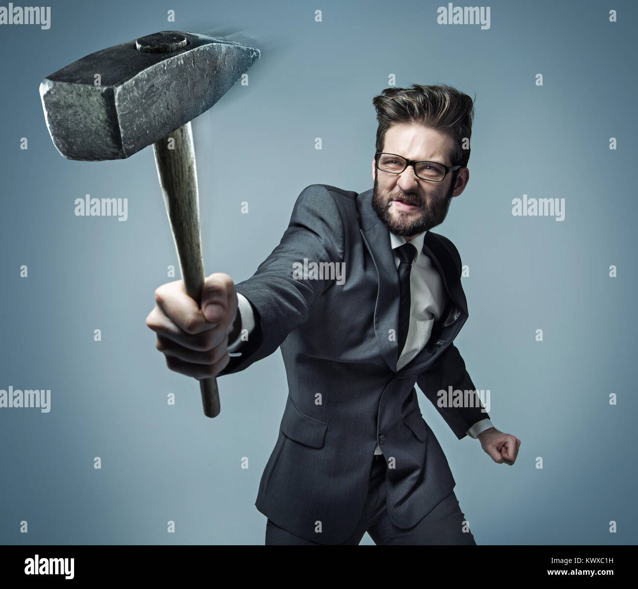 Conceptual picture of a powerful businessman Stock Photo - Alamy