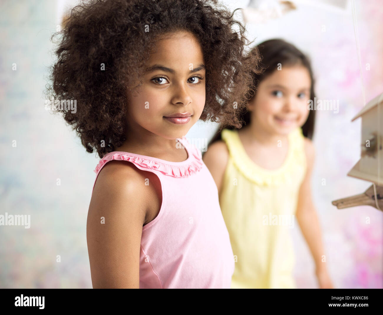 Portrait of two little and cute girls Stock Photo - Alamy