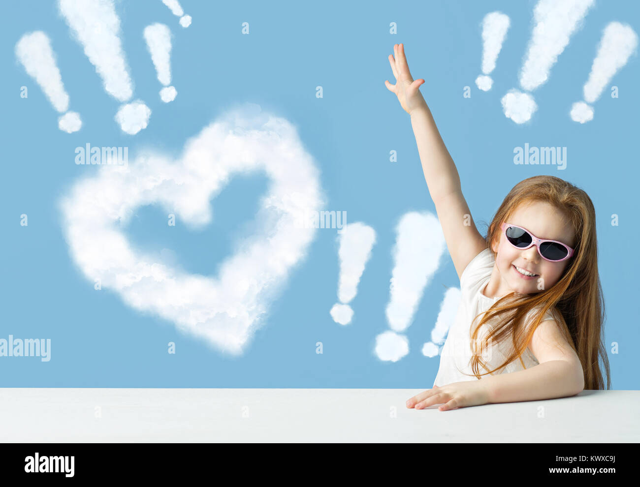 Conceptual picture of a kid indicating marks Stock Photo - Alamy