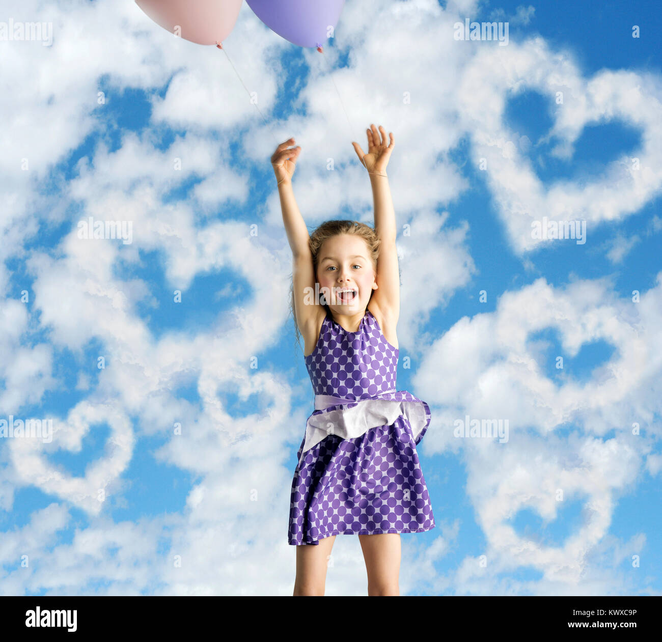 Little girl flying up to the sky Stock Photo - Alamy