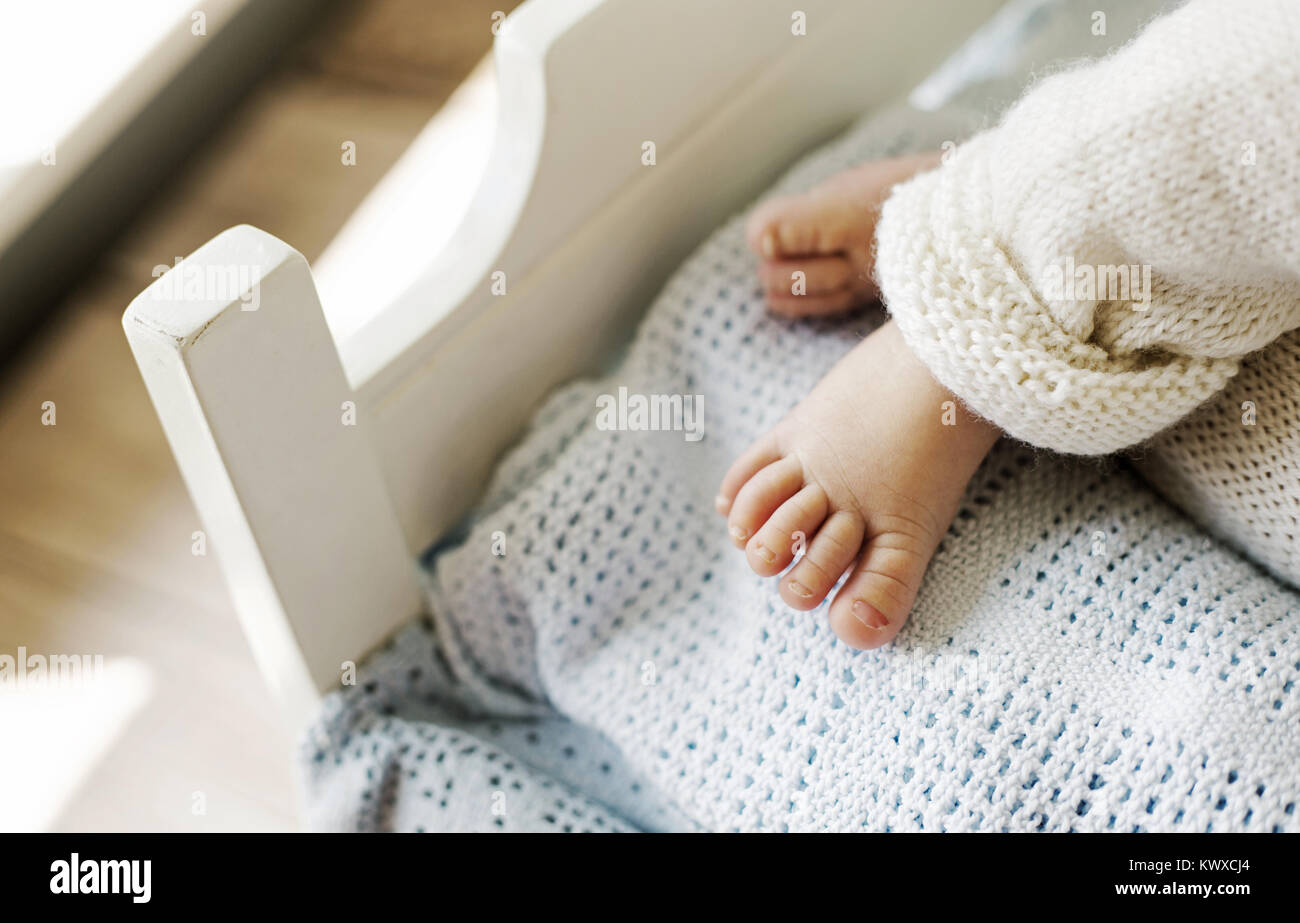 Newborn child's cute little foot Stock Photo - Alamy