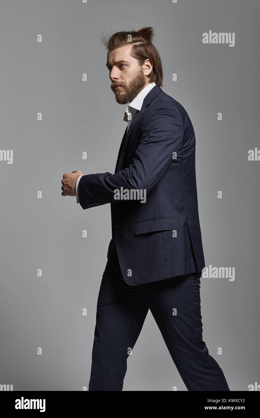 Serious handsome guy with a dense beard Stock Photo - Alamy