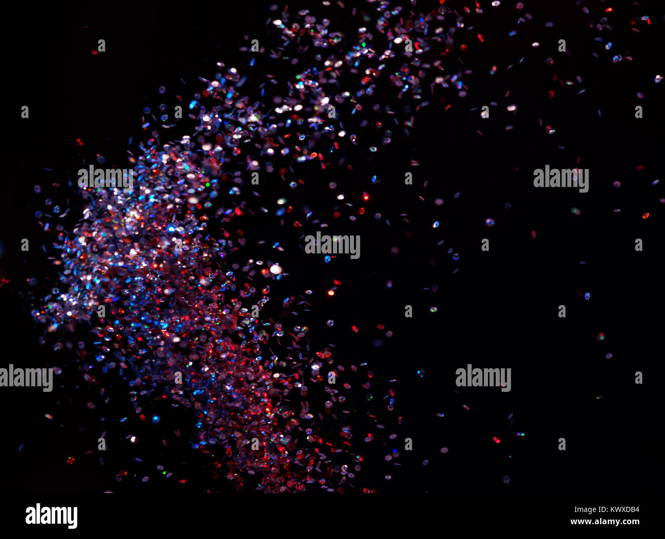 Lots of shiny sequins over the dark background Stock Photo - Alamy