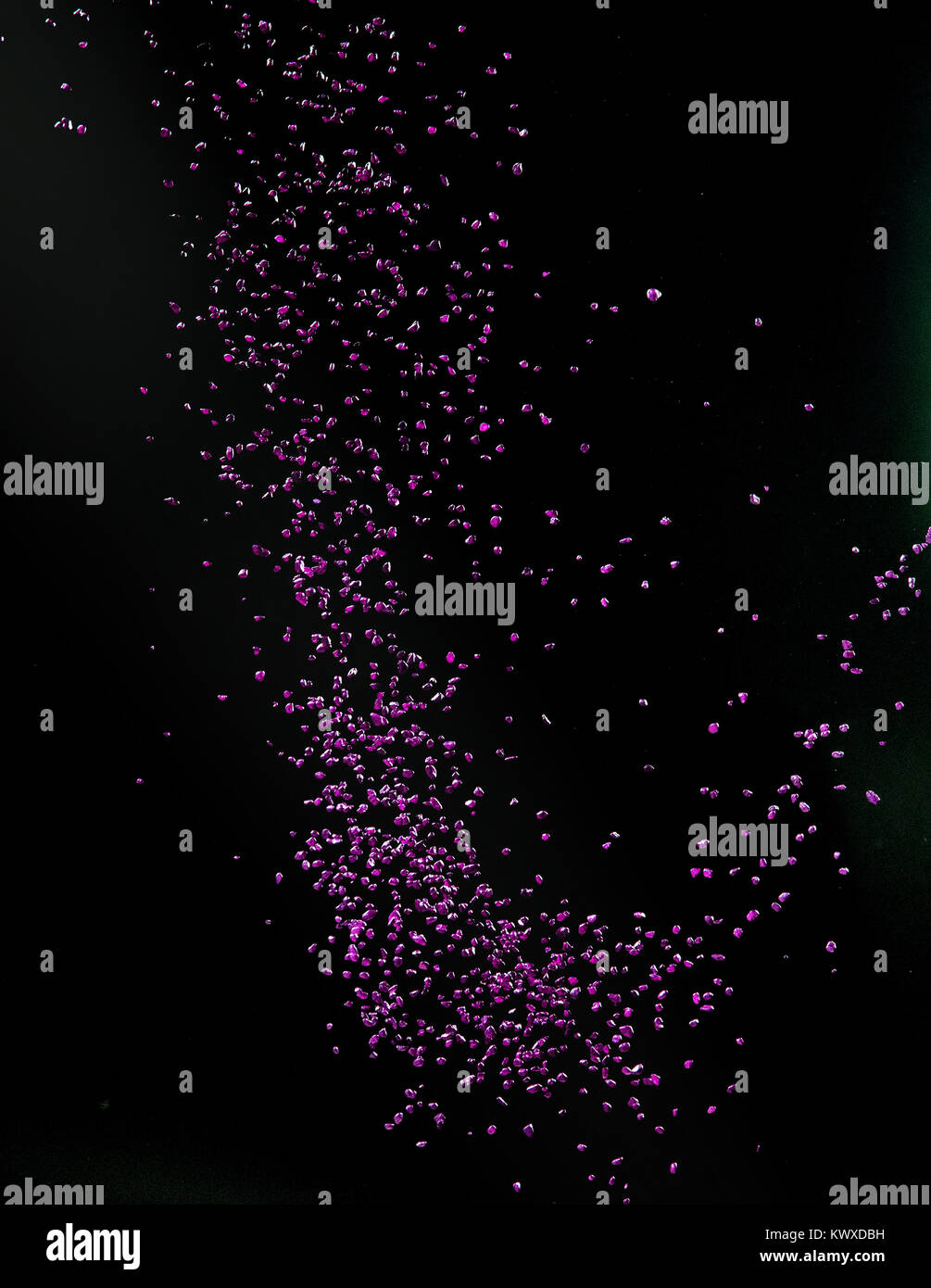 Tiny pieces of pink shiny crystal Stock Photo - Alamy