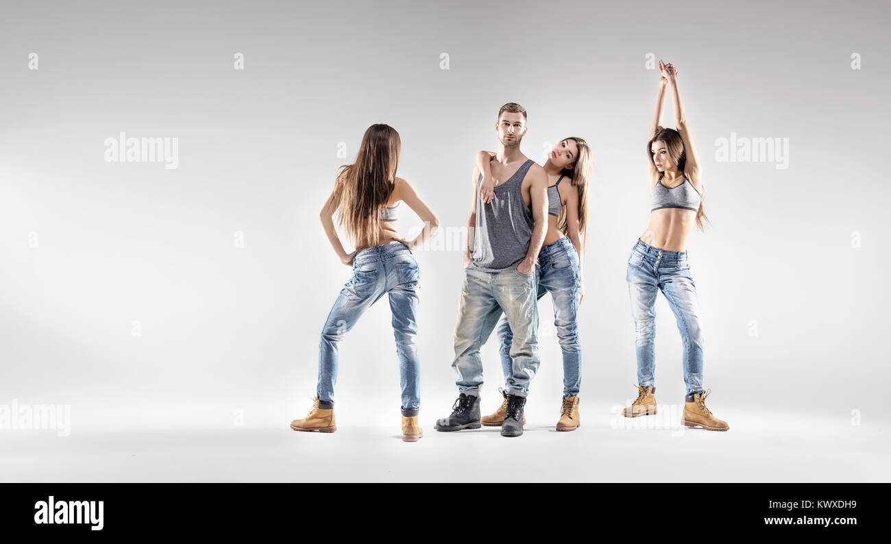 Handsome dancer with pretty hip-hop ladies Stock Photo - Alamy