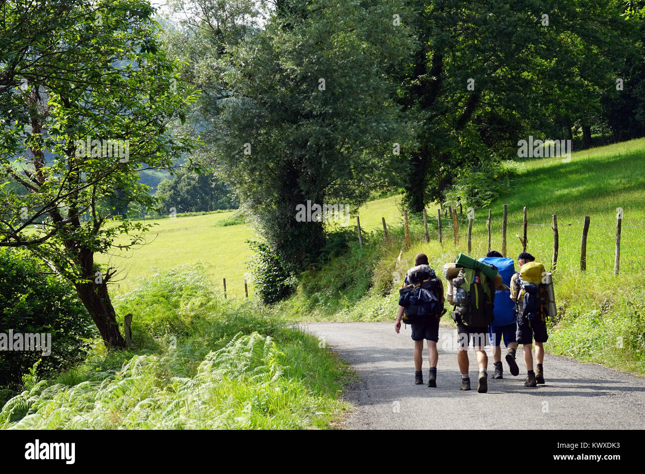 Backpackers on the road in rural area of France Stock Photo - Alamy