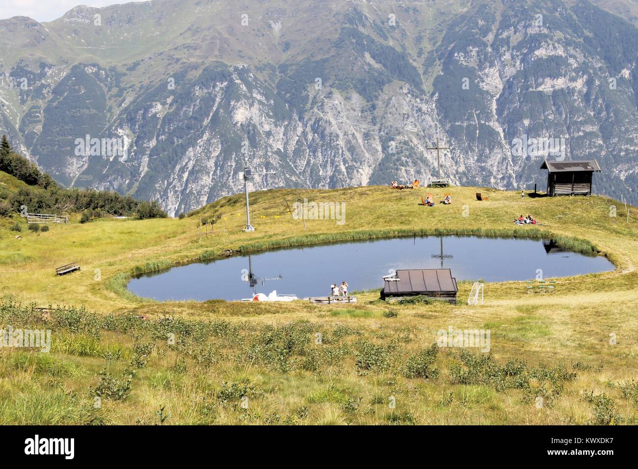 small alpine lake in the high mountains Stock Photo - Alamy