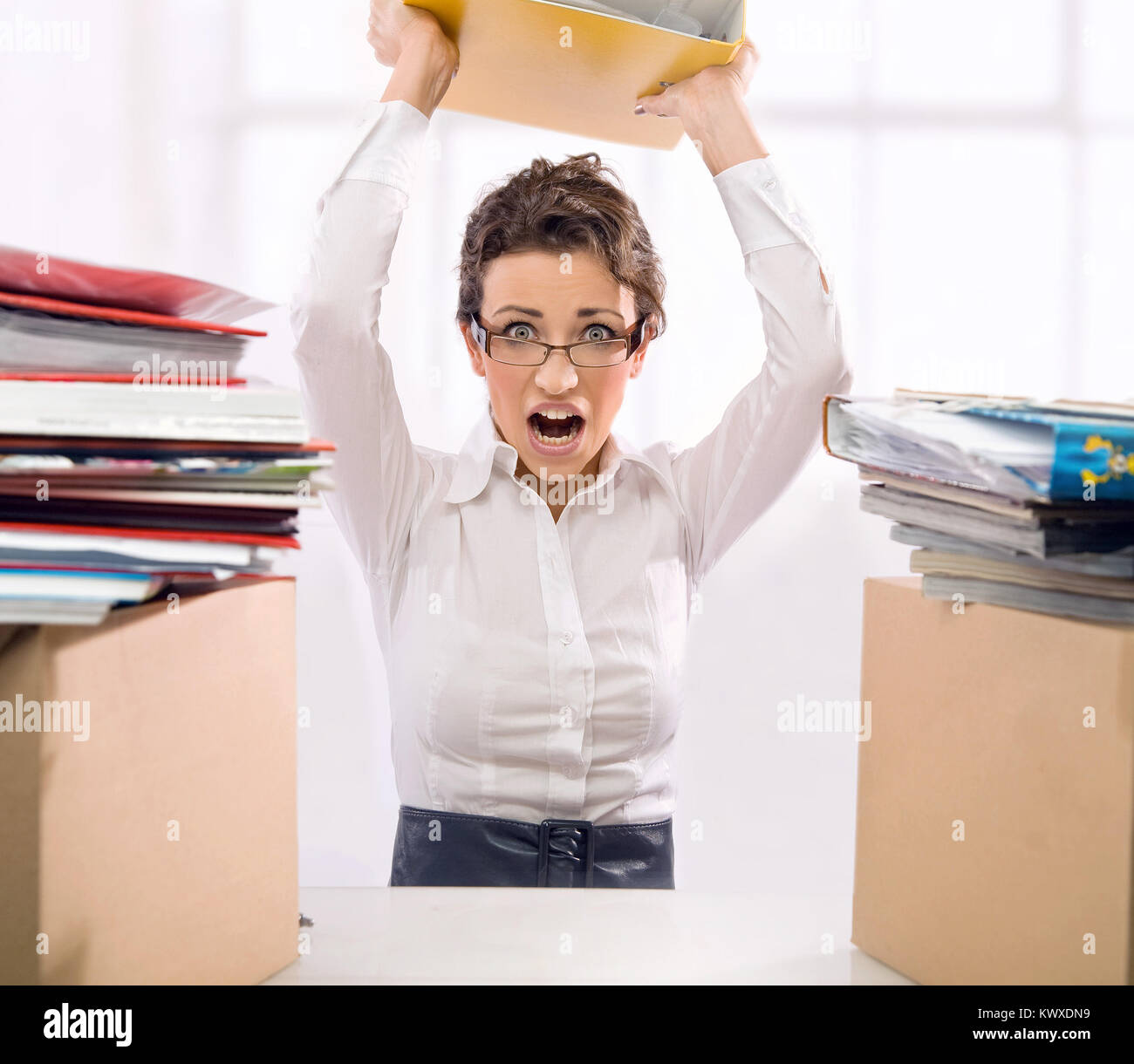 Upset and young employee preparing a balance sheet Stock Photo - Alamy