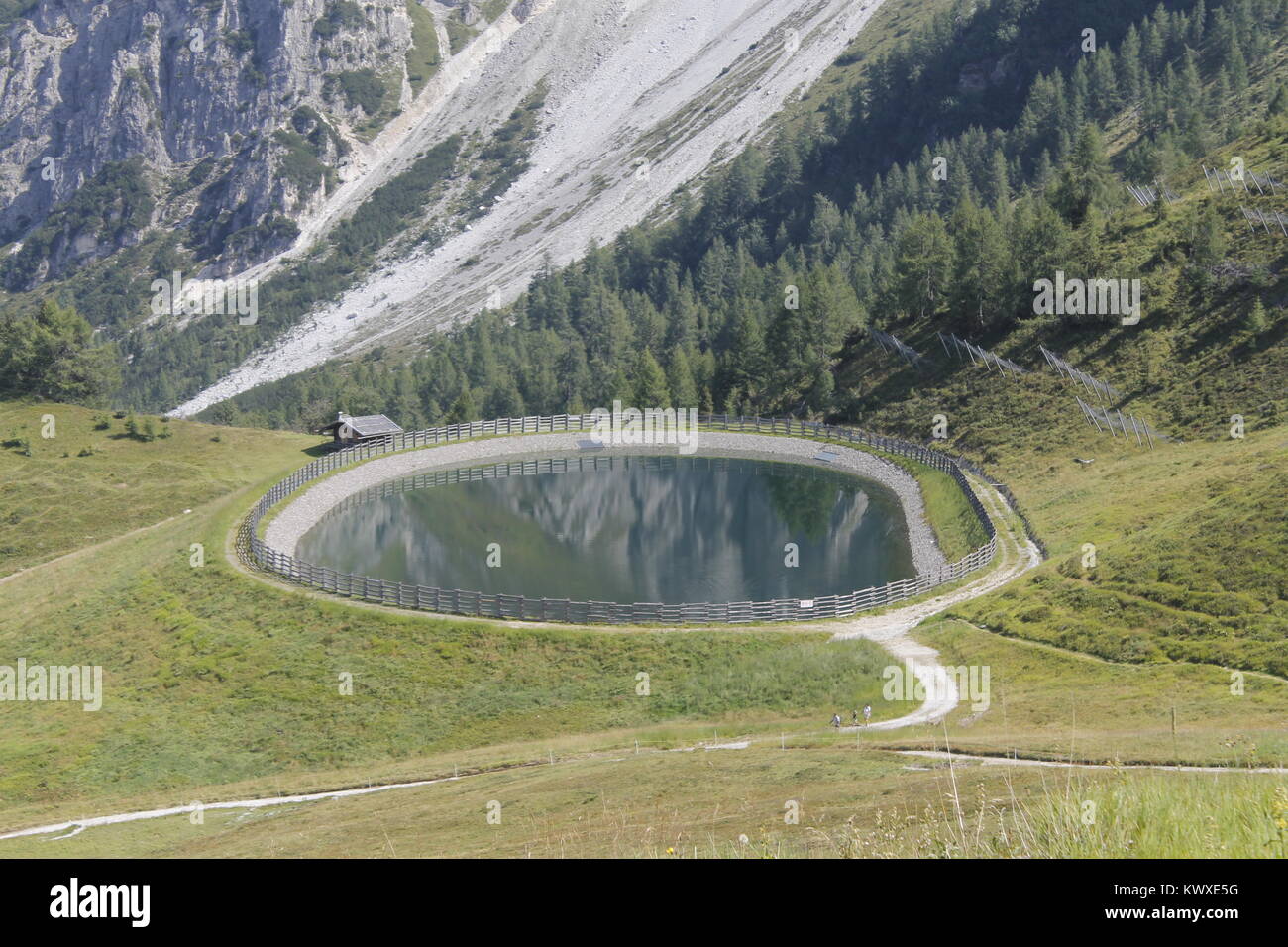 small alpine lake in the high mountains Stock Photo - Alamy