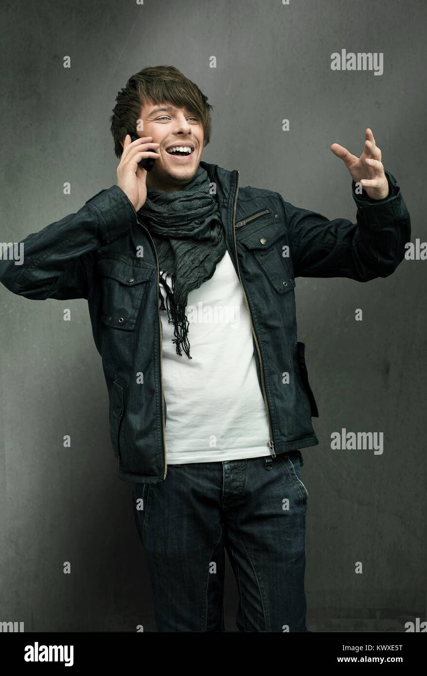 Handsome young guy talking on the cell phone Stock Photo - Alamy