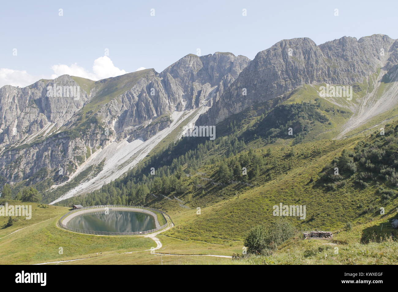 small alpine lake in the high mountains Stock Photo - Alamy
