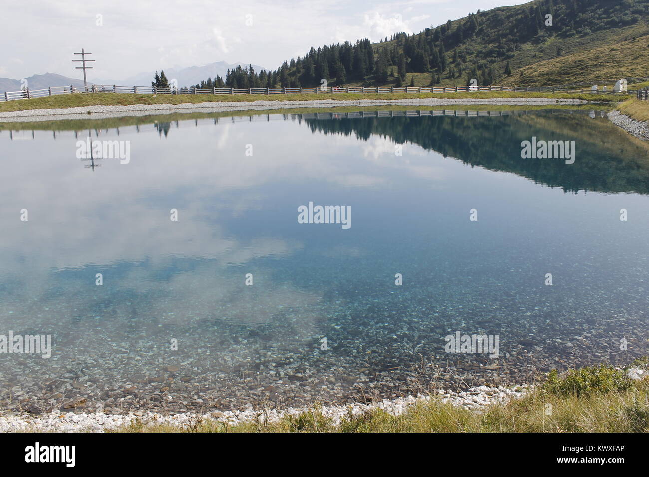 small alpine lake in the high mountains Stock Photo - Alamy