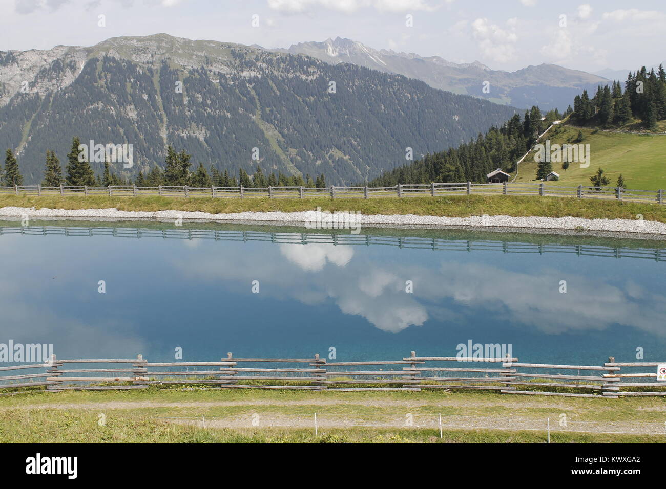 small alpine lake in the high mountains Stock Photo - Alamy