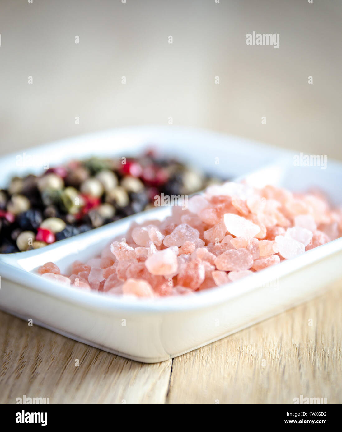 Pink himalayan salt and peppers Stock Photo - Alamy