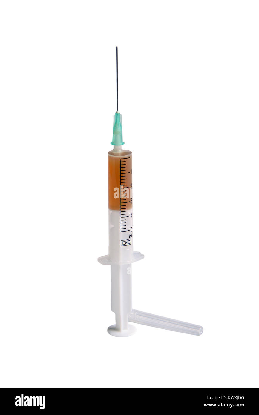 Disposable syringe with brown liquid isolated on white Stock Photo - Alamy