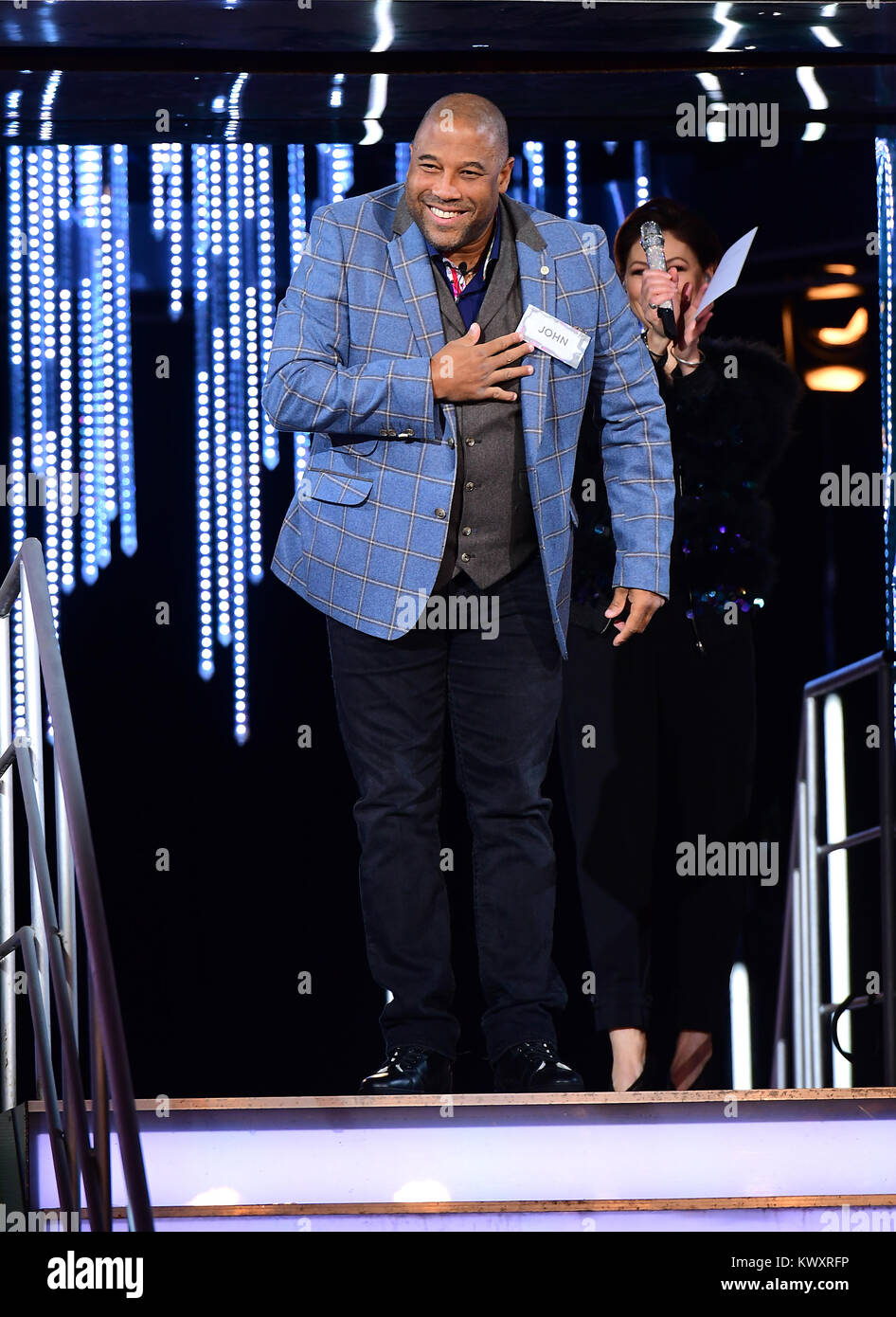 John Barnes enters the house during the Celebrity Big Brother Men's ...
