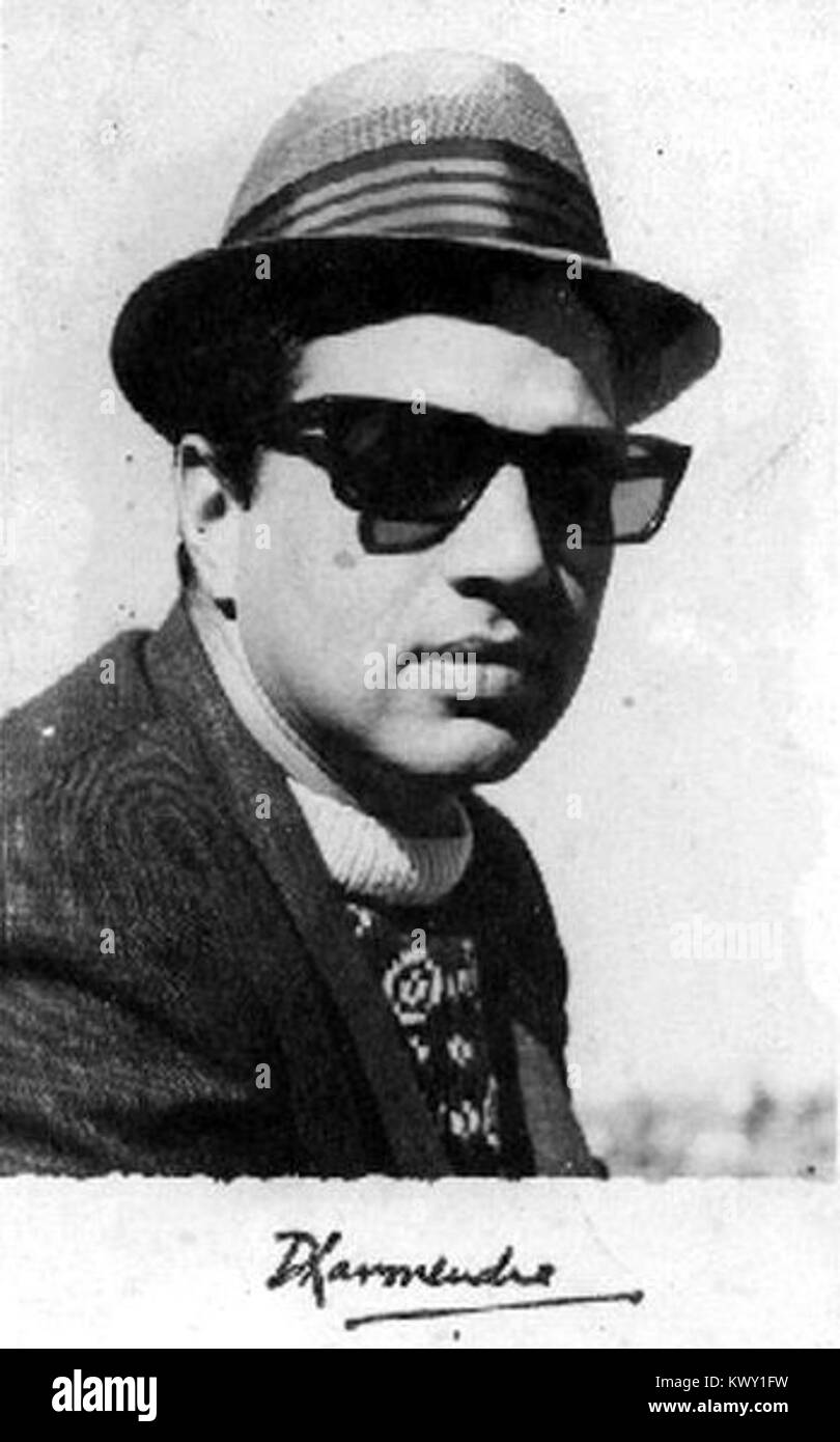 This signed photograph of Indian actor Dharmendra presents his ...