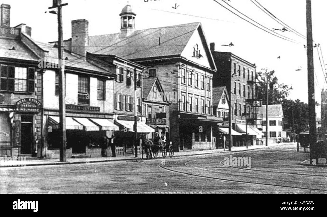A historical image of Medford Square and its train station from the ...