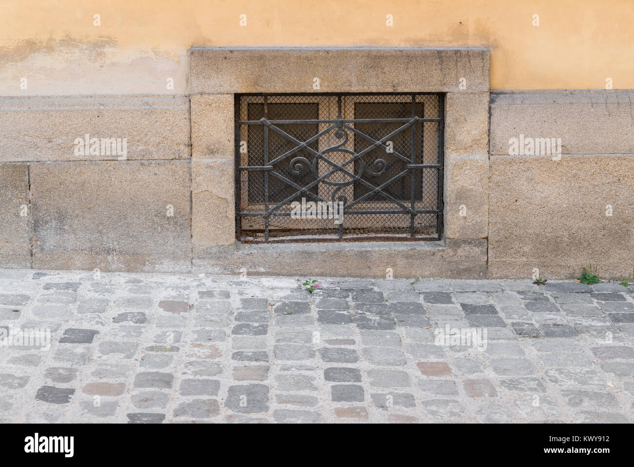 Old rusty Cellar window with iron grating Stock Photo - Alamy