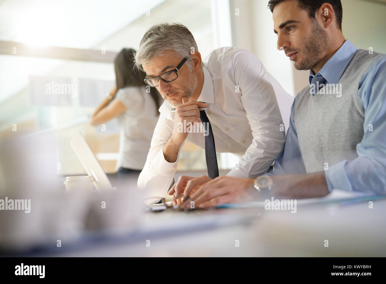 Financial people working together on budget in office Stock Photo - Alamy