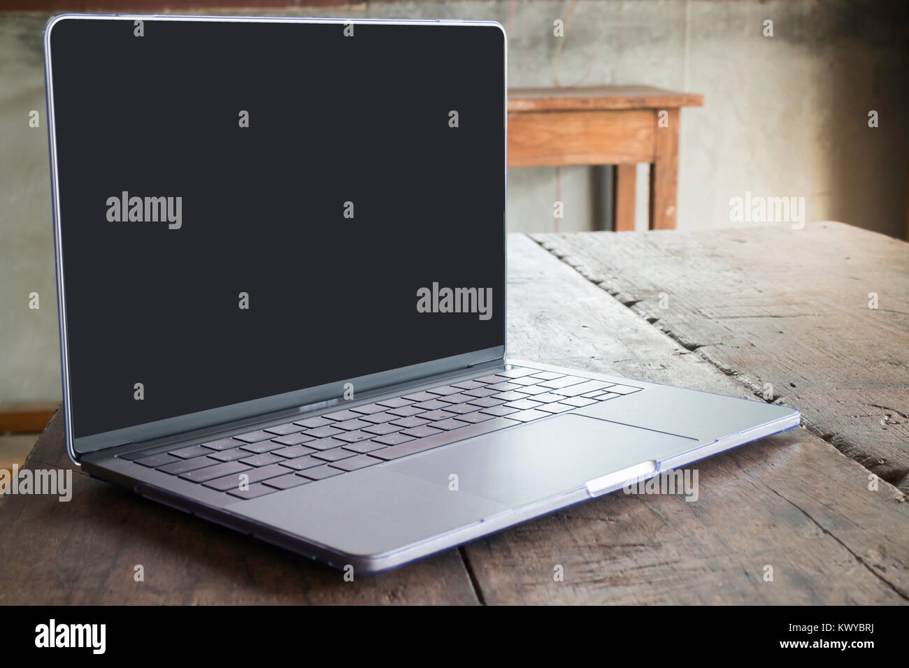 Modern grey metal laptop on wooden table, stock photo Stock Photo - Alamy