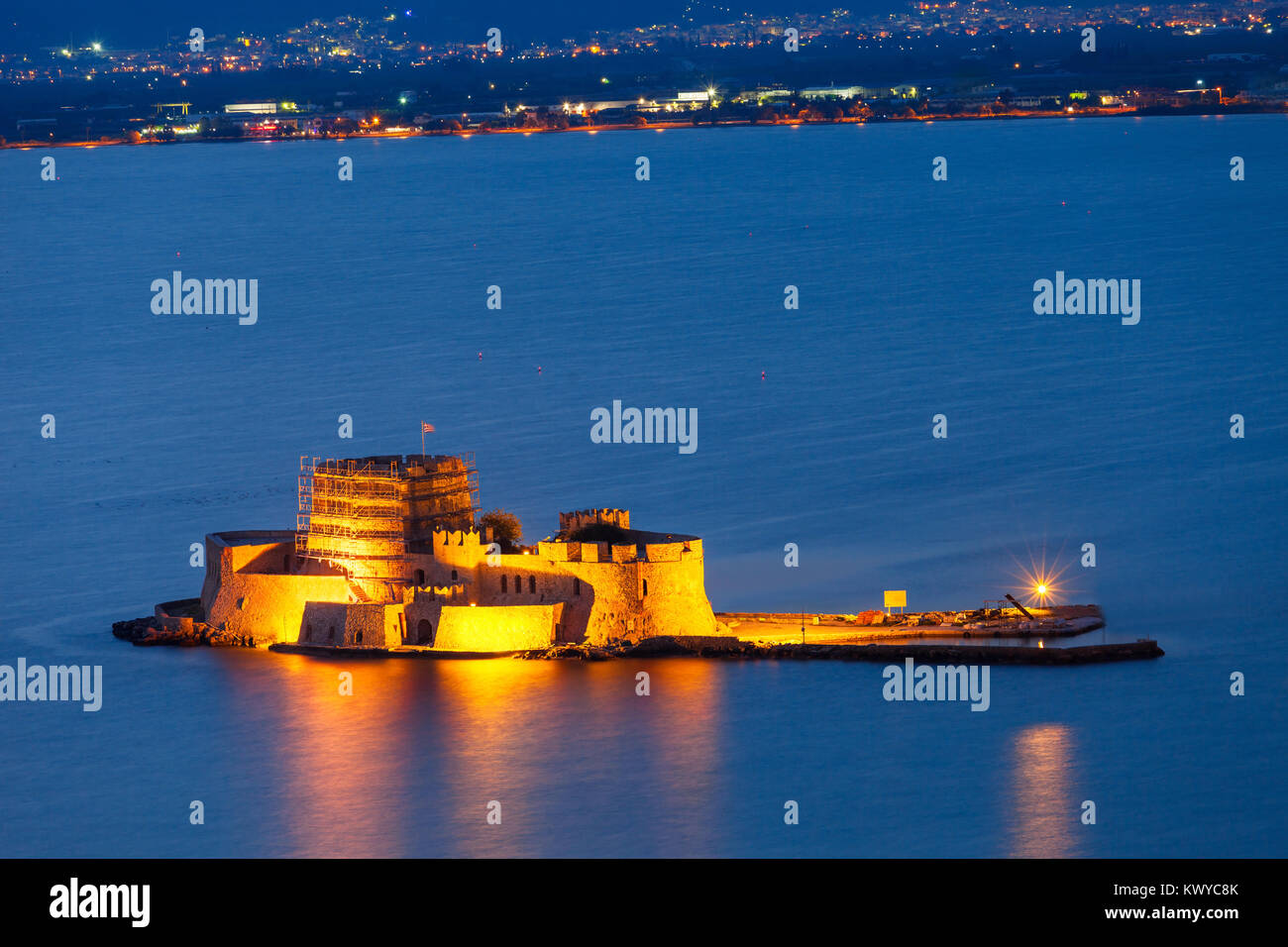 Bourtzi water fortress in Nafplio at night. Nafplio is a seaport town ...