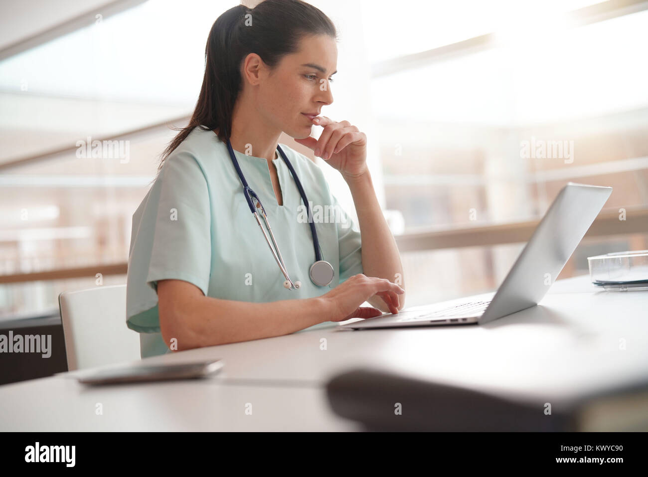 Professional nurse working laptop hi-res stock photography and images ...
