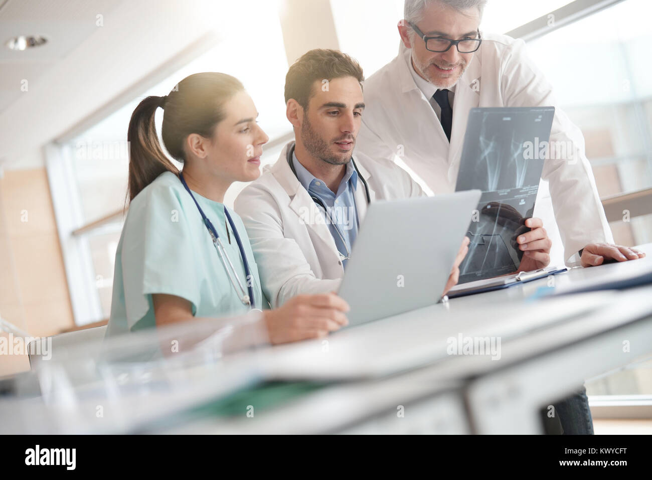 Team checking hi-res stock photography and images - Alamy