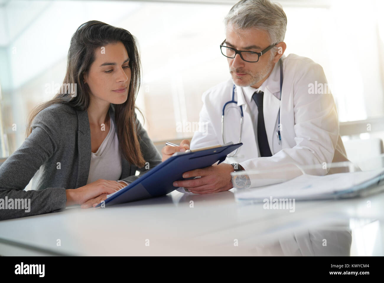 Patient meeting doctor for medical prescription Stock Photo - Alamy