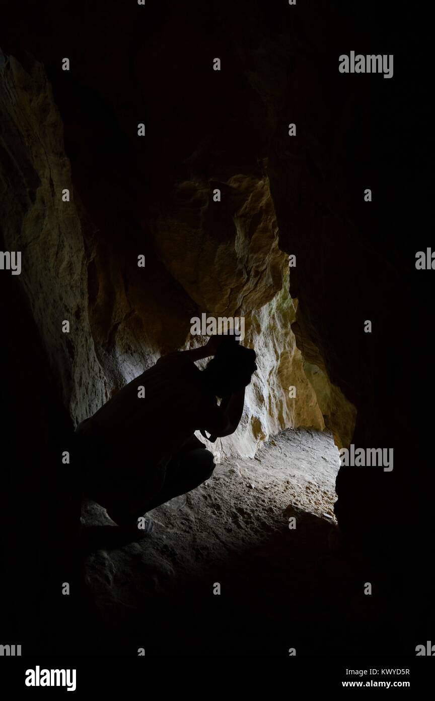 a man in a cave Stock Photo - Alamy