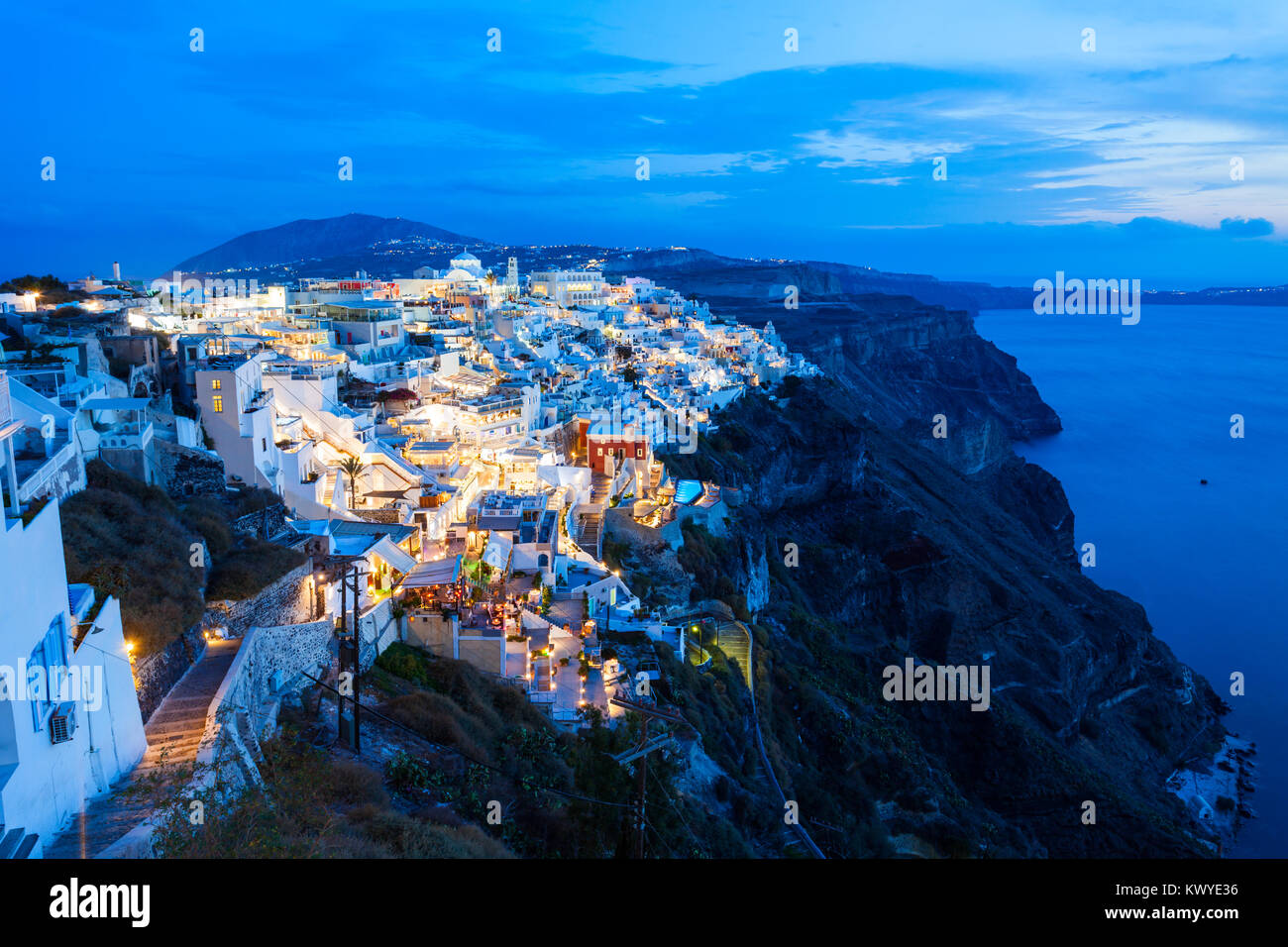 Fira town aerial panoramic view, Santorini at sunset. Fira is the ...