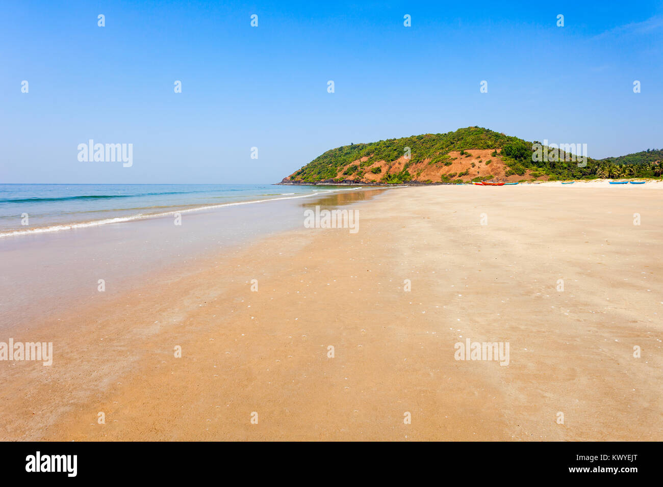 Beauty lonely beach with yellow sand in Goa, india Stock Photo - Alamy