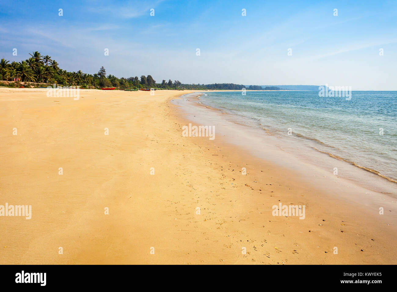 Beauty lonely beach with yellow sand in Goa, india Stock Photo - Alamy
