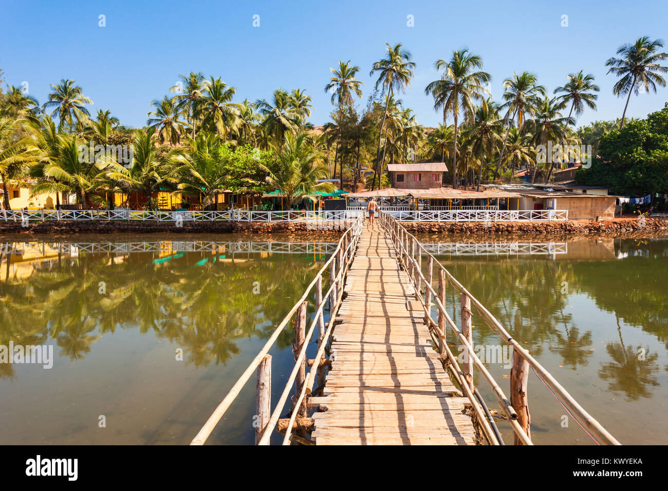 Bridge through small river on Mandrem beach in north Goa, India Stock ...