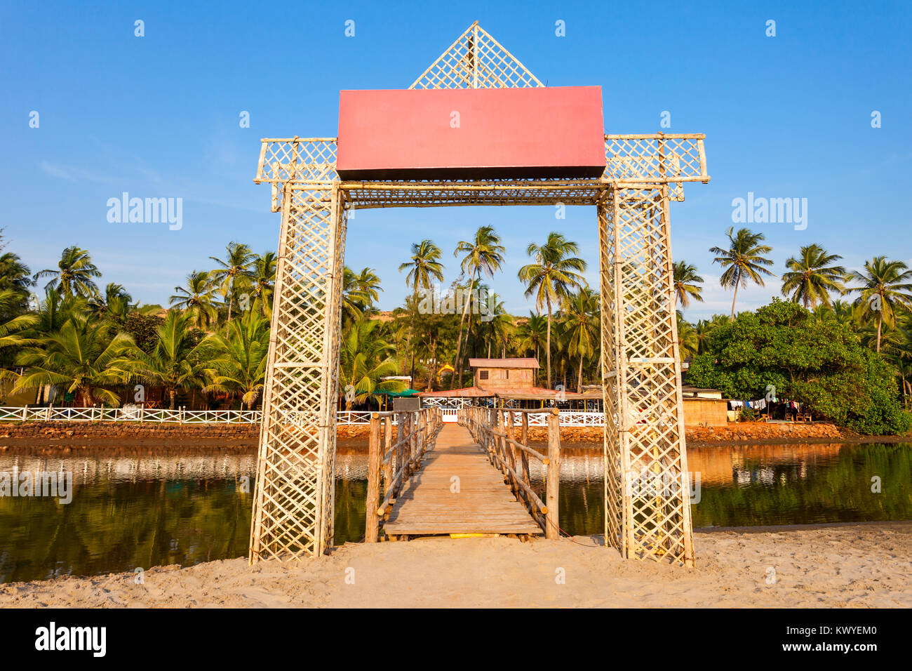Bridge through small river on Mandrem beach in north Goa, India Stock ...