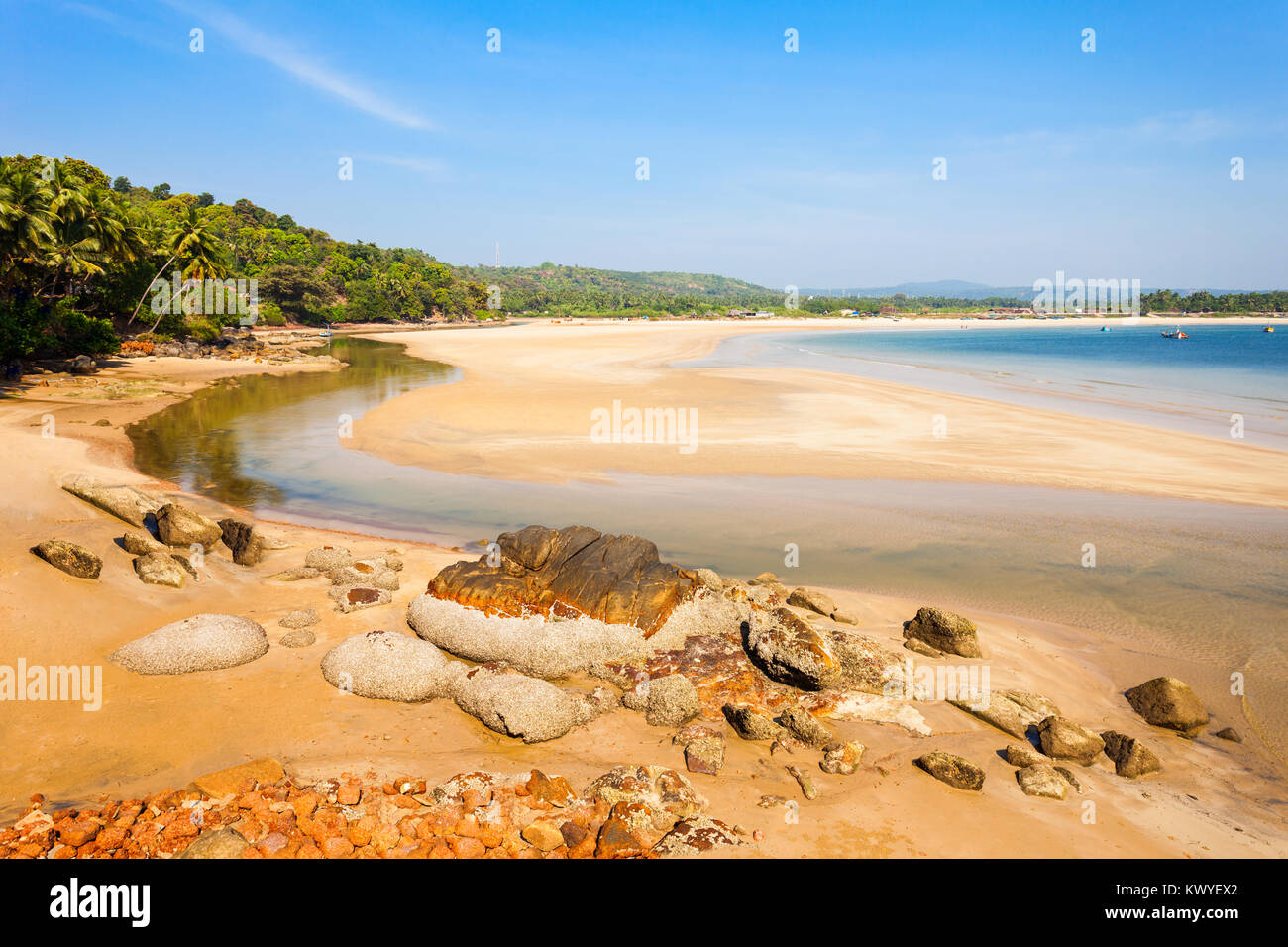 Beauty lonely beach with lagoon and yellow sand in Goa, India Stock ...