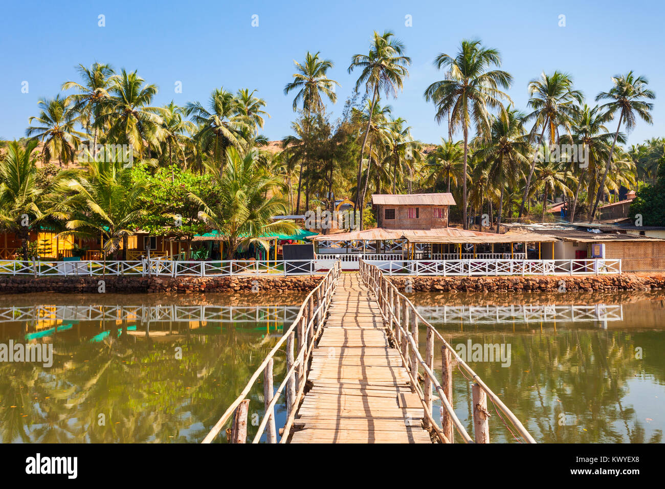 Bridge through small river on Mandrem beach in north Goa, India Stock ...