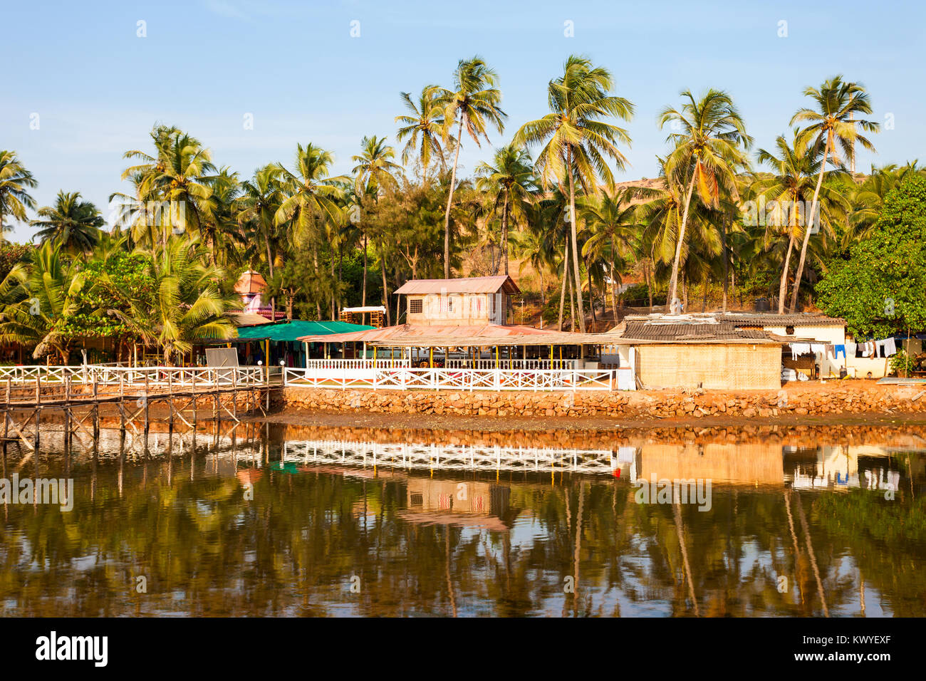 Bridge through small river on Mandrem beach in north Goa, India Stock ...
